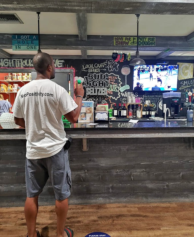 The bar area where friendly staff mix drinks and dispense wisdom about the best menu items available.