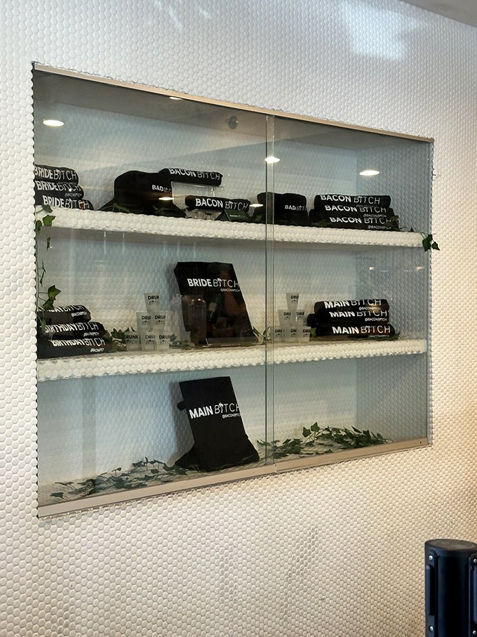 Take the attitude home &ndash; merchandise displayed behind glass lets fans represent their bacon allegiance long after breakfast ends.