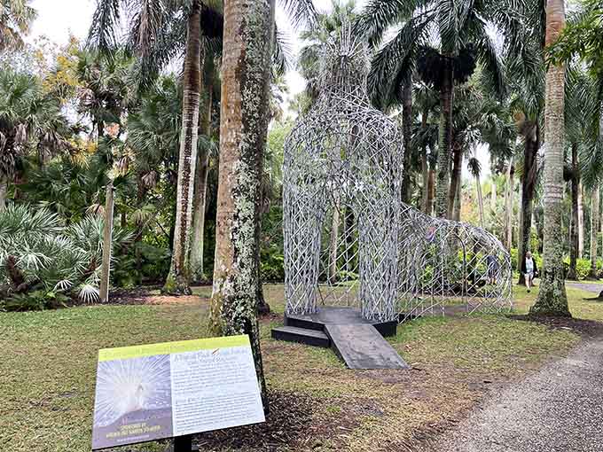 The Platinum Peahen Promenade sculpture looks like a bird decided to become modern art, and honestly, it's working beautifully.