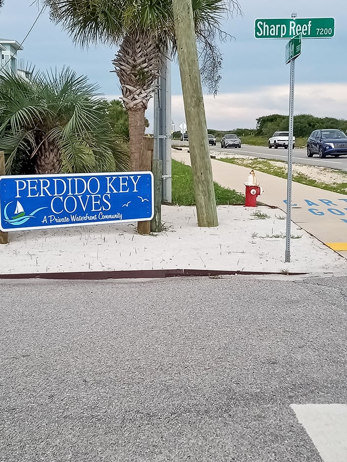 The entrance to Perdido Key Coves welcomes visitors to this slice of coastal paradise, where natural beauty reigns supreme.