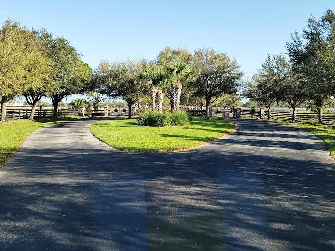 A perfect circular drive surrounded by manicured grounds, the calm before the wild beauty of the Grade.