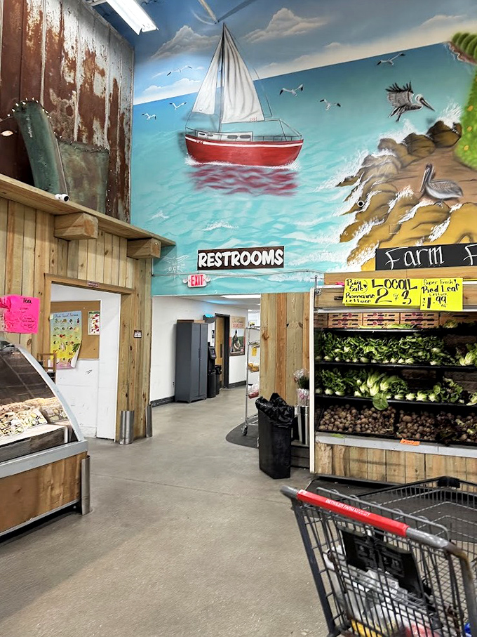 Nautical charm: That sailboat mural isn't just decoration &ndash; it's a reminder that good food connects us to land, sea, and tradition.