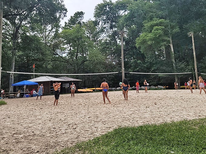 Beach volleyball brings the competitive spirit to Ginnie Springs' sandy shores - game point anyone?