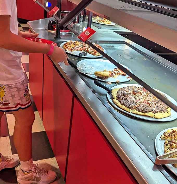 Pizza bar: Fresh pies emerge from the oven at physics-defying speeds, ensuring no adventurer faces their next challenge on an empty stomach.