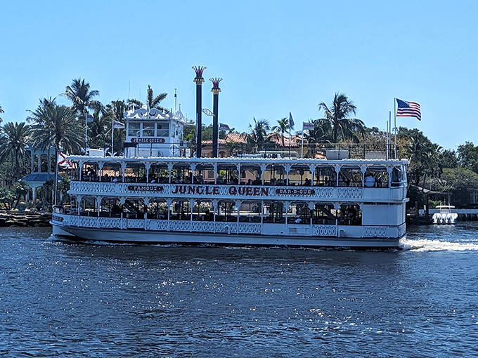 The Jungle Queen in all her glory, white superstructure gleaming against the blue Florida water as she carries another group of soon-to-be-stuffed passengers.