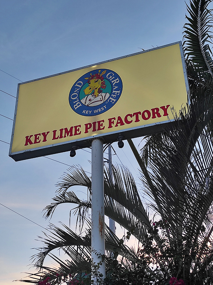 The Blond Giraffe Key Lime Pie Factory's sign stands as a beacon for dessert pilgrims seeking the ultimate Florida Keys sweet experience.
