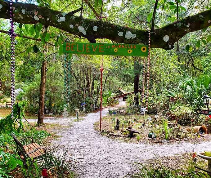 The "Believe in Miracles" archway marks the entrance to the trail, setting expectations appropriately high for the magical journey ahead through this woodland wonderland.