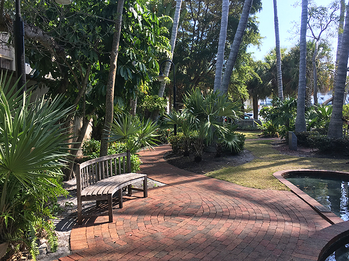 Murphy Park's brick pathways wind through tropical gardens, offering quiet benches where visitors can pause to appreciate the island's lush botanical diversity.