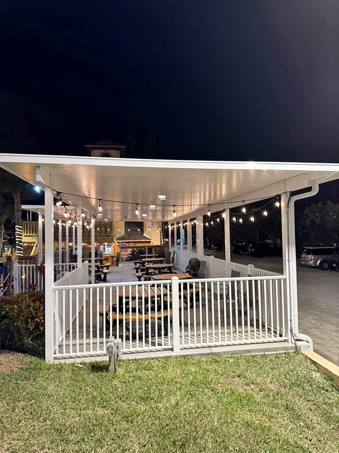 Evening relaxation under twinkling lights makes this patio the perfect spot to debate whose "six" was actually more like a "nine" over soft-serve consolation prizes.
