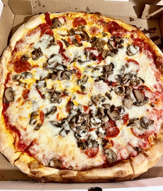 The classic combination that never disappoints&mdash;savory pepperoni discs and earthy mushrooms playing perfectly together on a cheese canvas.