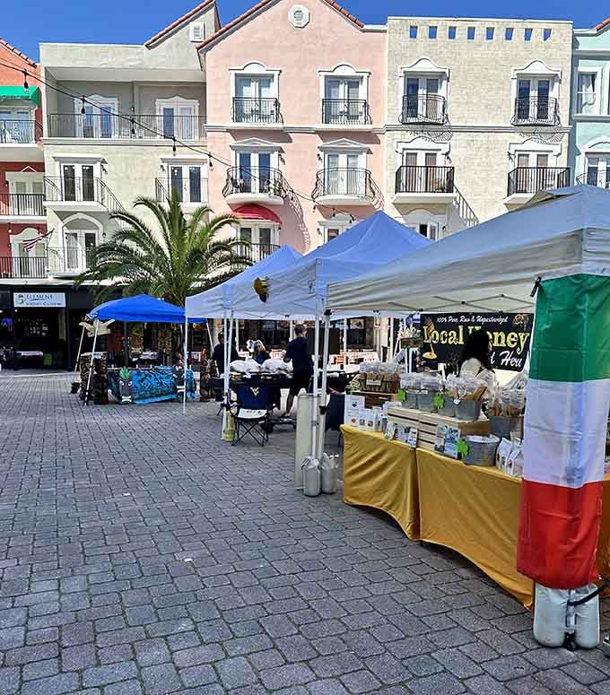 Market stalls line the walkways offering everything from honey to handicrafts, each vendor adding their unique flavor to the mix.