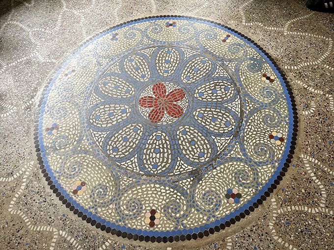 Floor mosaics made from shells and colored stones turn every step into a small adventure, assuming you can stop looking down long enough to move forward.