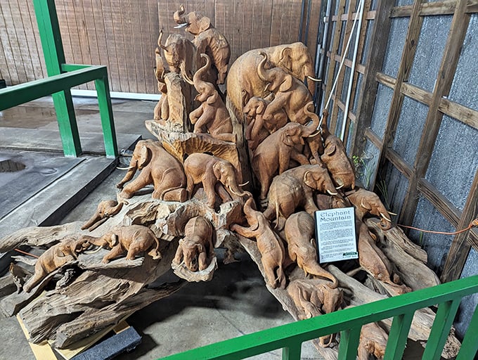 "Elephant Mountain" &ndash; this intricate wood carving showcases the artistic celebration of these magnificent creatures at the ranch.