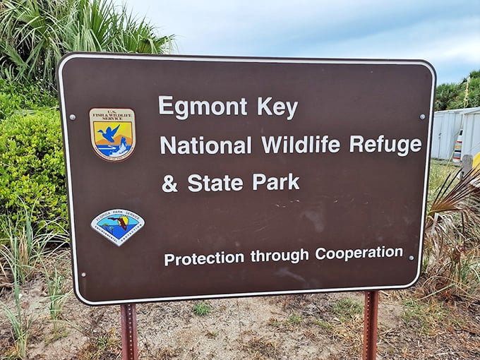 Official signage welcomes adventurers to Egmont Key, where wildlife refuge meets state park in perfect conservation harmony.