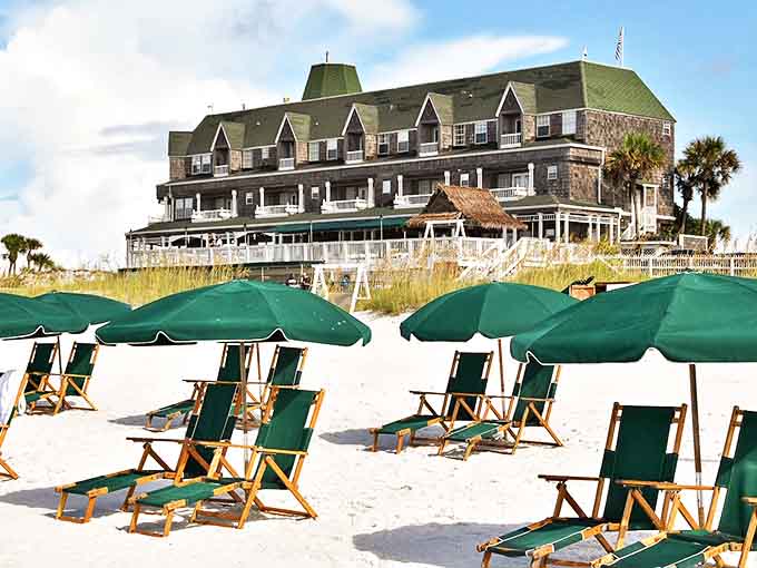 The Henderson Park Inn's distinctive architecture stands tall against Destin's famous emerald waters and sugar-white sands.