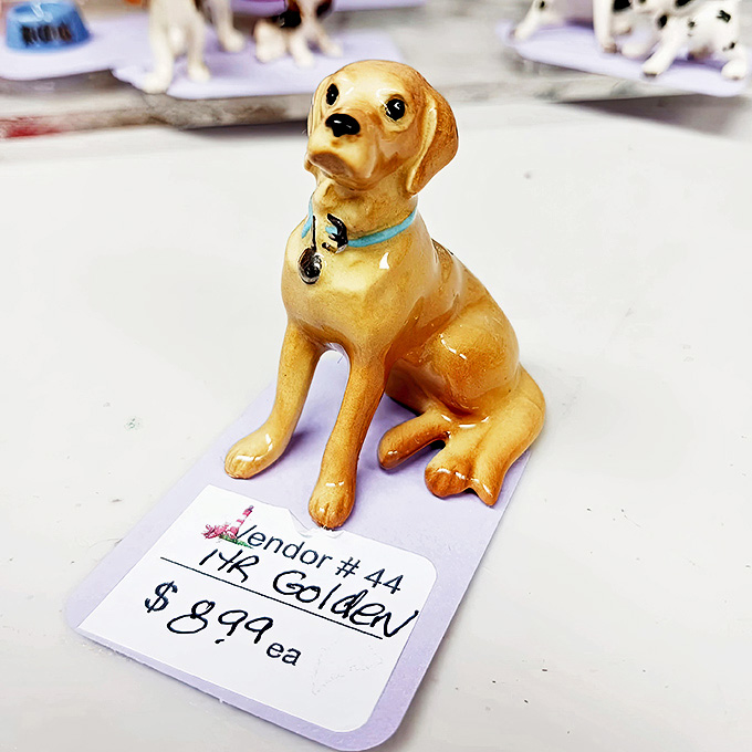 This ceramic golden retriever sits patiently at $8.99, waiting for someone who recognizes the unconditional love in those painted eyes.