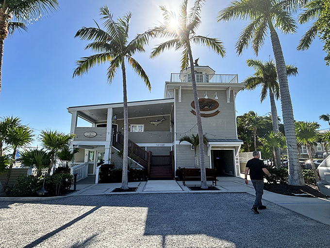 The Eagle & Miller's distinctive white building with observation deck offers panoramic views of the harbor, where fishing boats return with their silvery bounty.