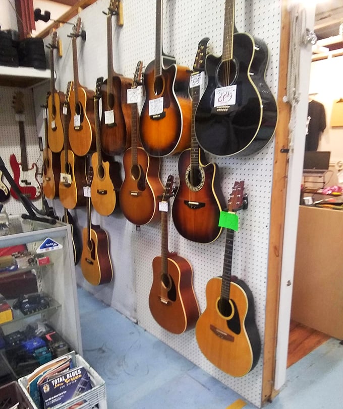 Guitar heaven for six-string dreamers&mdash;where vintage instruments hang like promises of garage bands yet to be formed.