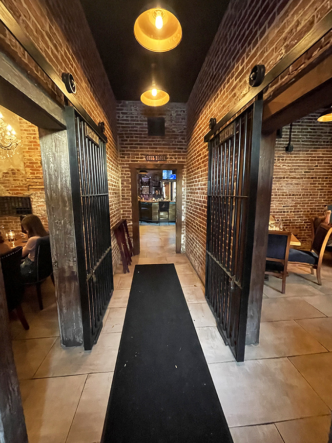 Walking this corridor feels like stepping through time &ndash; original cell doors frame your journey to the dining room, a reminder of the building's fascinating past life.