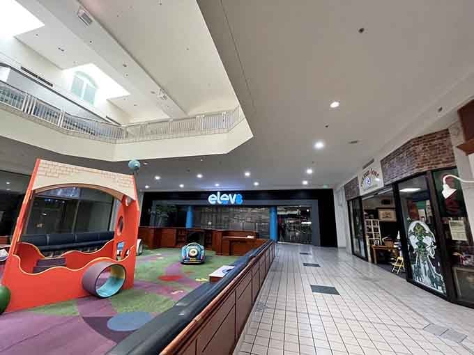 The mall entrance hints at the massive entertainment complex hiding inside, like Clark Kent concealing his Superman cape under business casual.