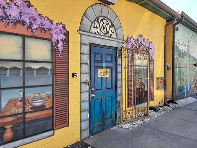 Even the exterior murals are charming, giving you a preview of the Italian magic waiting inside those walls.