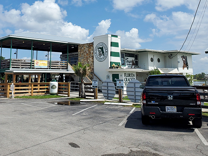 The exterior view showcases the restaurant's prime waterfront location, where your car might be the only thing not floating in this seafood paradise.