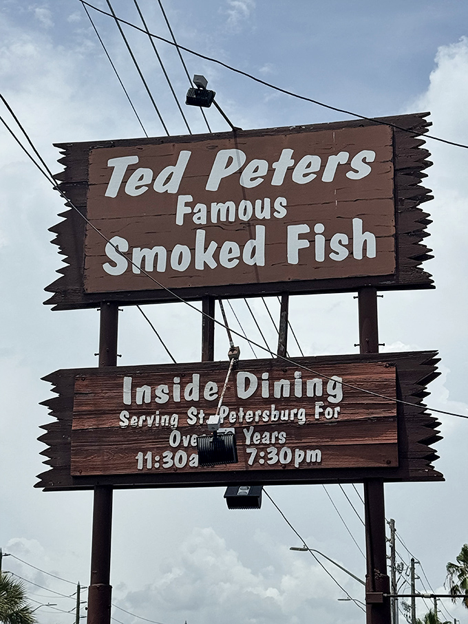 Follow the smoke to the flavor! This rustic sign signals you&rsquo;ve found a true St. Petersburg institution serving famous smoked fish.