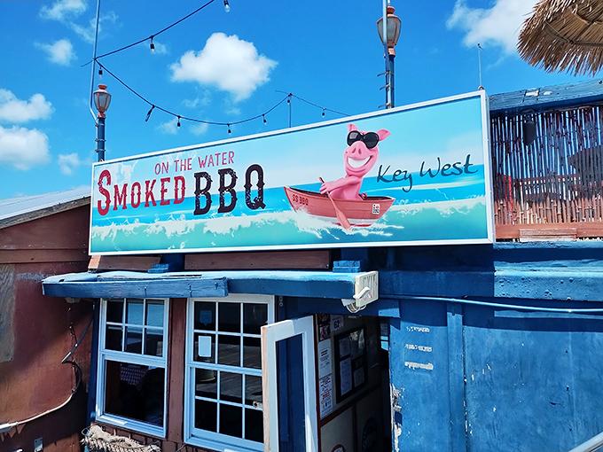 The sign says it all&mdash;a cartoon pig in sunglasses living its best life, just like everyone who eats here.