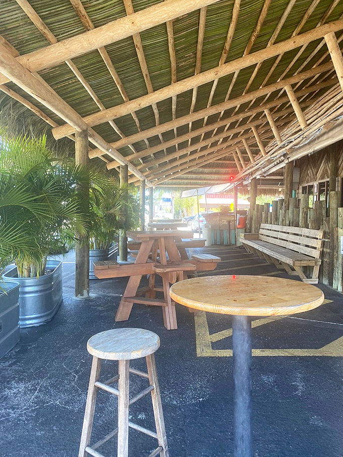 Outdoor seating that captures Florida's laid-back soul. Those wooden tables have hosted more seafood celebrations than we can count.