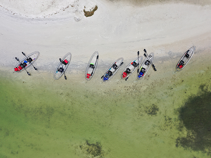 Nature's parking lot: These transparent vessels lined up along the shore look like alien crafts waiting to transport visitors through Florida's liquid wonderland.