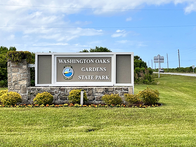 This unassuming entrance sign gives no hint of the natural paradise waiting just beyond.
