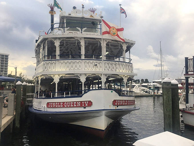 The Jungle Queen IV awaits her next adventure, her ornate white railings and red trim embodying the nostalgic charm that keeps guests coming back decade after decade.
