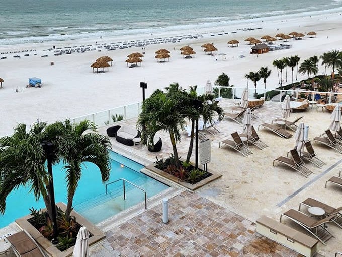 Beach cabanas at JW Marriott Marco Island lined up like soldiers ready for the battle against your stress. The ocean view from that pool deck? Better than therapy.