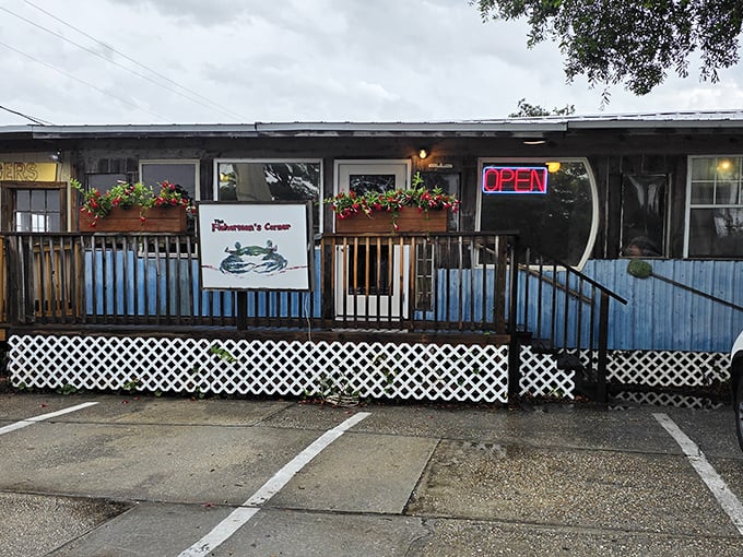 The unassuming exterior of Fisherman's Corner hides seafood treasures within. That blue-trimmed porch has welcomed hungry locals for years!