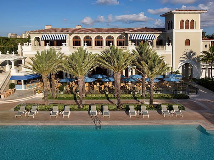 Mediterranean elegance meets Florida sunshine at The Breakers, where palm trees stand at attention like nature's own bellhops.