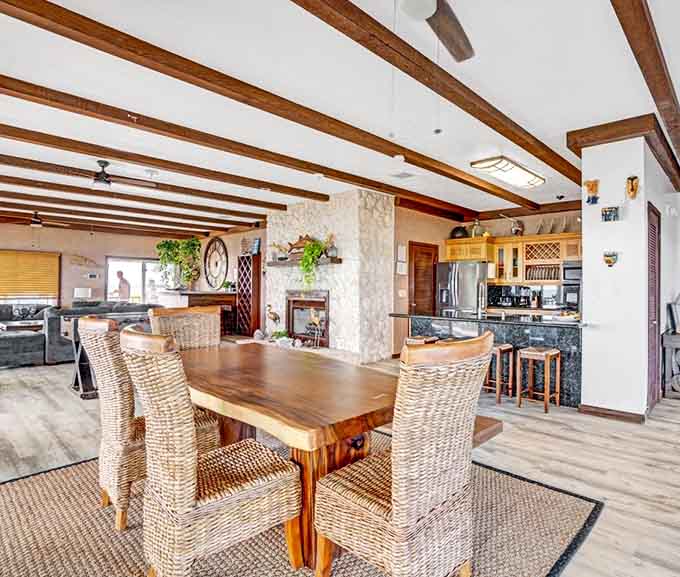 The dining area proves that eating with an ocean view isn't just for fancy restaurants, it's for smart people who rent private islands instead.