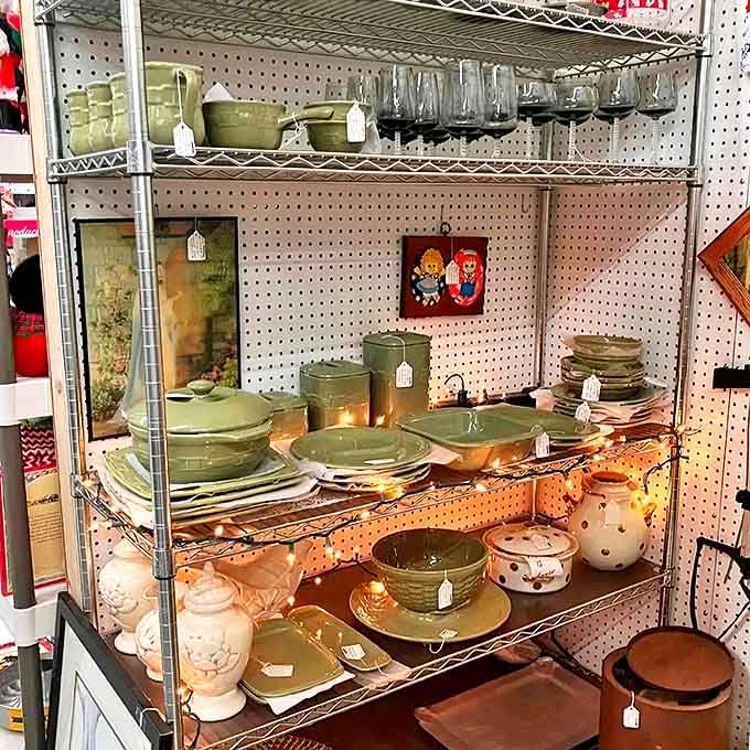 Jade-green dishware gleams under display lights, each piece whispering stories of Sunday dinners and holiday gatherings from generations past.