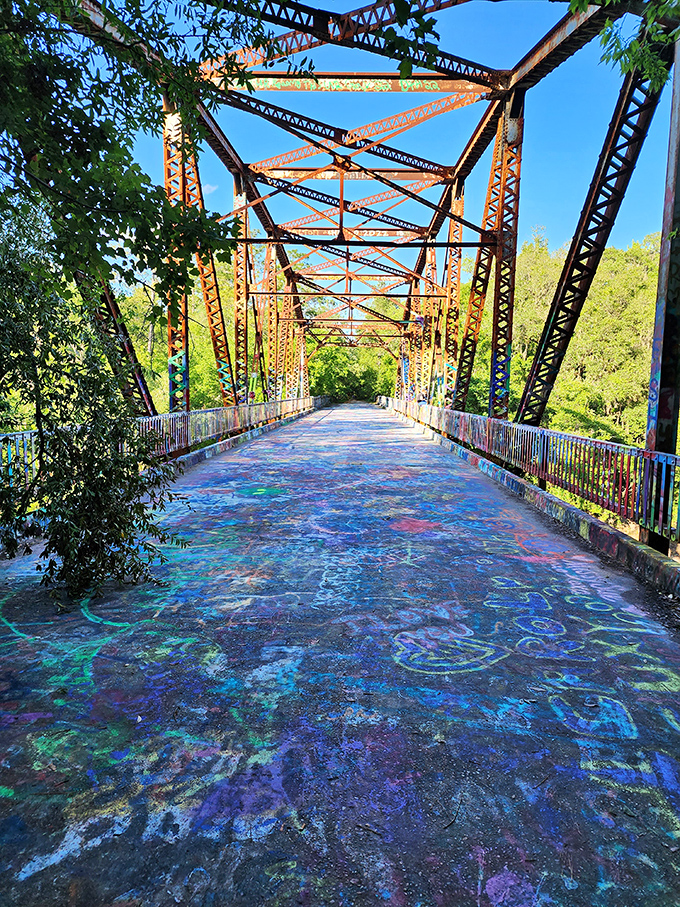 Steel meets sky as you enter this open-air gallery, where industrial architecture provides the perfect canvas for spontaneous creativity.
