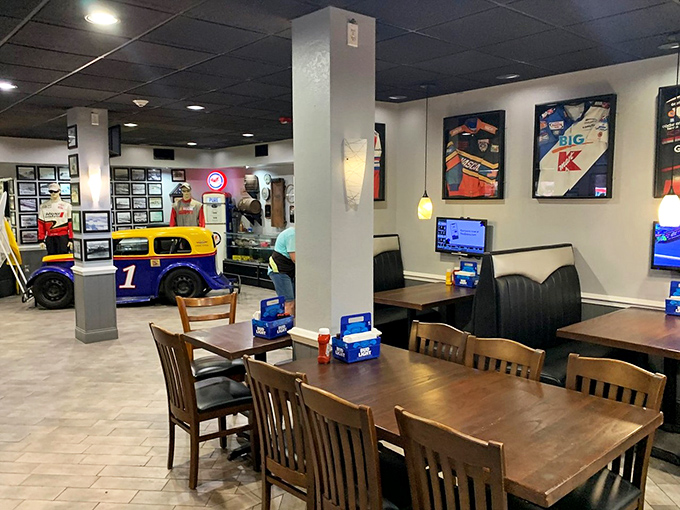 Inside, racing history meets coastal comfort as vintage memorabilia adorns the walls while comfortable seating invites you to settle in for a memorable meal.