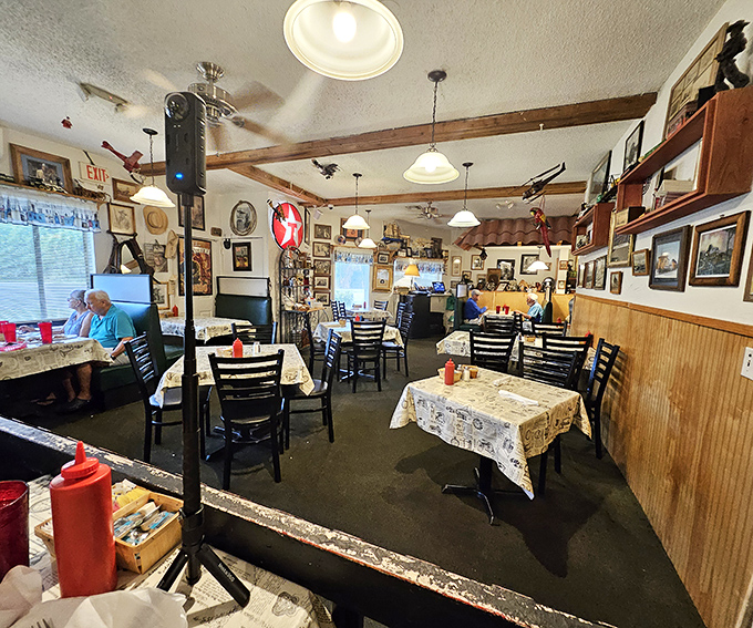 Time-worn wooden beams and walls adorned with memories create a dining room that feels like your favorite uncle's den&mdash;if he could cook like a dream.