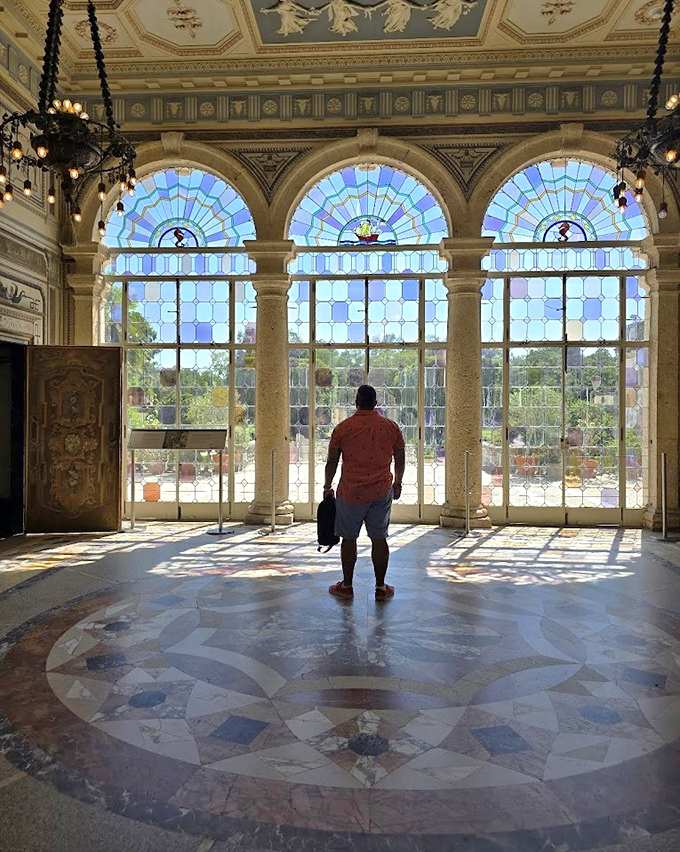 Sunlight dances through stained glass, creating a light show on marble floors that would make any disco ball jealous.
