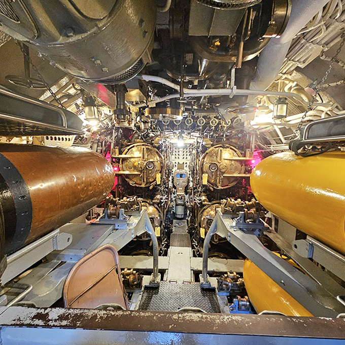 Inside the submarine's torpedo room, where young sailors once loaded 3,000-pound "fish" destined for enemy ships.