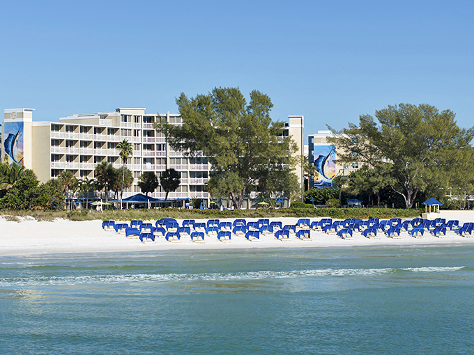 The beachfront view that greets guests daily &ndash; where the Gulf of Mexico meets pristine white sand in a perfect vacation handshake.