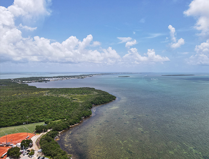 From above, Tavernier's stunning geography reveals itself &ndash; a patchwork of turquoise waters, lush greenery, and island living.