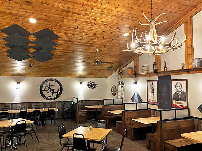 Interior: Warm wood ceilings, antler chandeliers, and comfortable seating create the perfect backdrop for meat-induced euphoria.