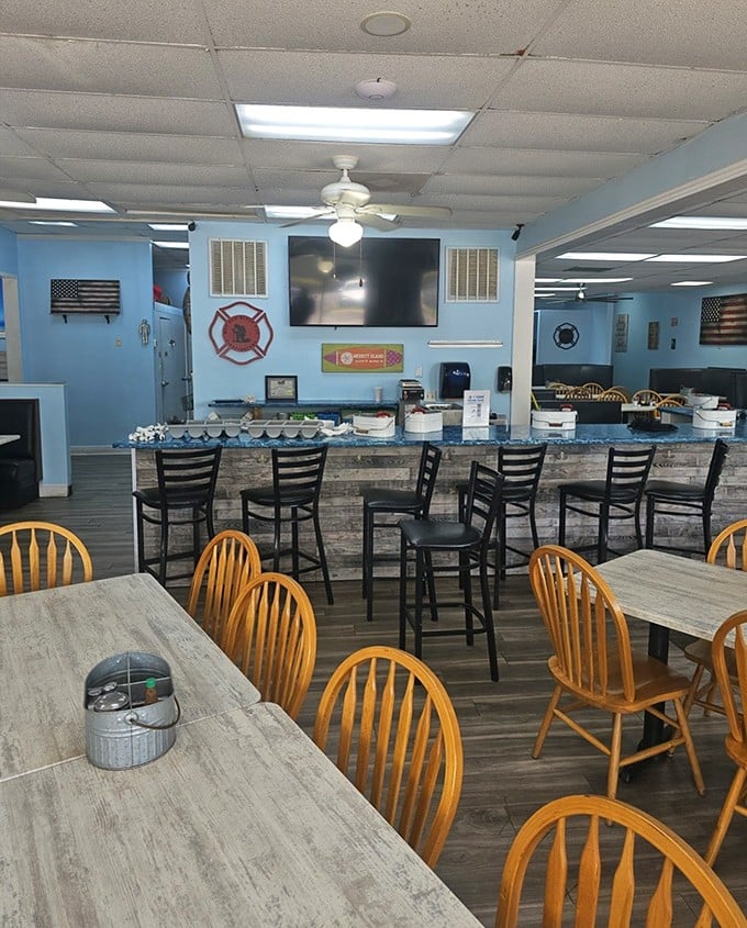 Light blue walls, wooden chairs, and patriotic decor create a homey atmosphere where the only thing more comforting than the setting is the food.