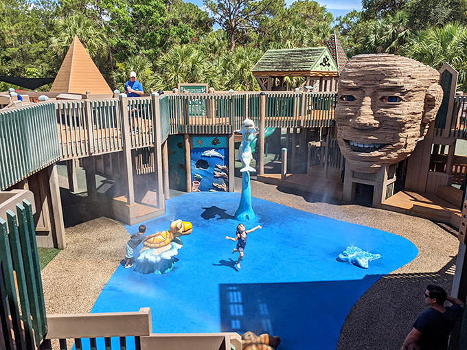 Splash zone magic! This whimsical water play area features a tree face that occasionally drenches delighted kids below &ndash; Florida's natural air conditioning system.