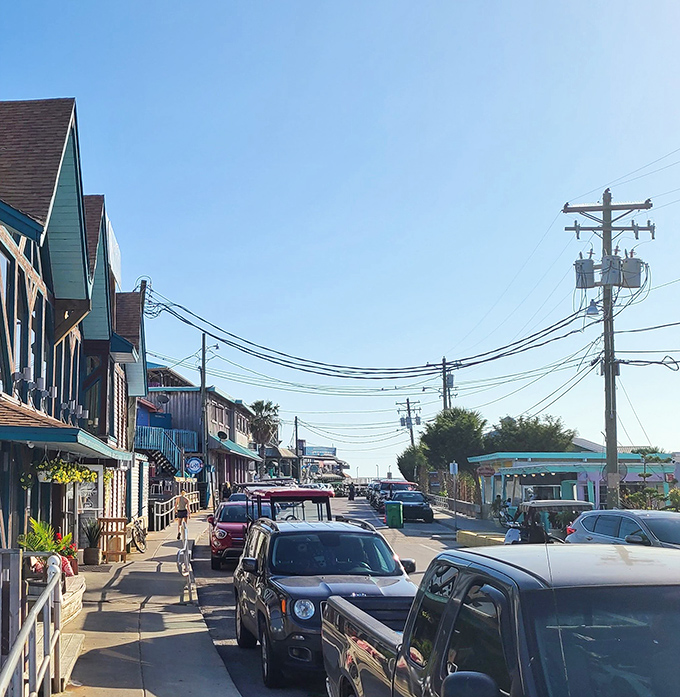 Strolling down this street feels like walking through a coastal movie set where seafood is always the star.