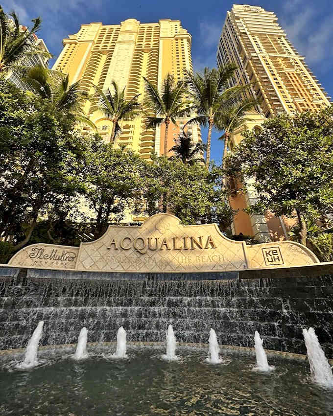 Waterfall dreams and golden towers! Acqualina's dramatic entrance announces you've arrived somewhere special, where luxury flows as freely as the fountains.