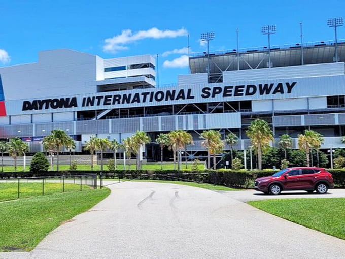 The Daytona International Speedway stands ready for action, where speed demons have been making history since your grandparents were young.